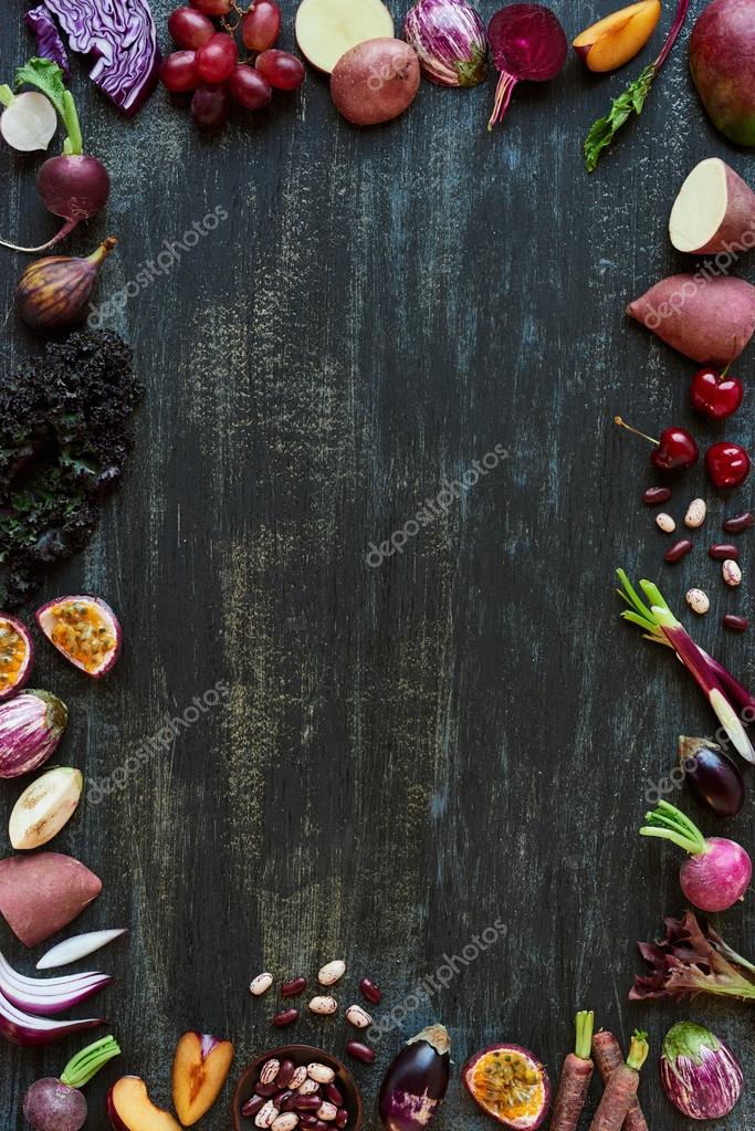 Border of fruits and vegetables on dark background Stock Photo by ...
