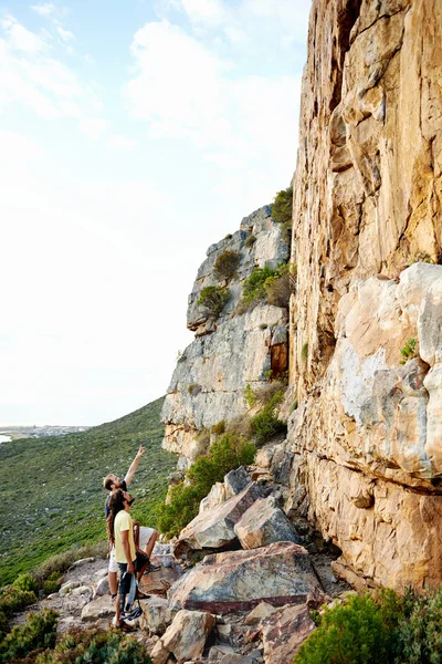 Man rock climbs on steep cliff — Stock Photo © Daxiao_Productions #74908011