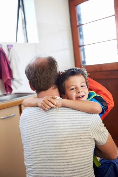 Father and son hug goodbye before school Stock Photo by ©Daxiao ...