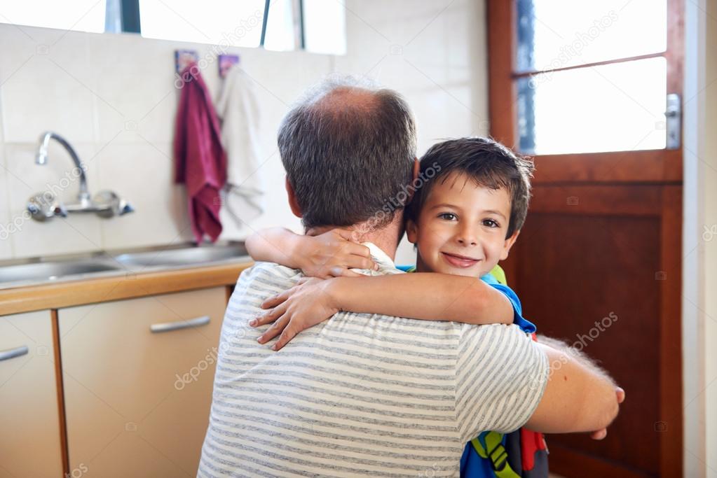 Father and son hug goodbye before school Stock Photo by ©Daxiao ...