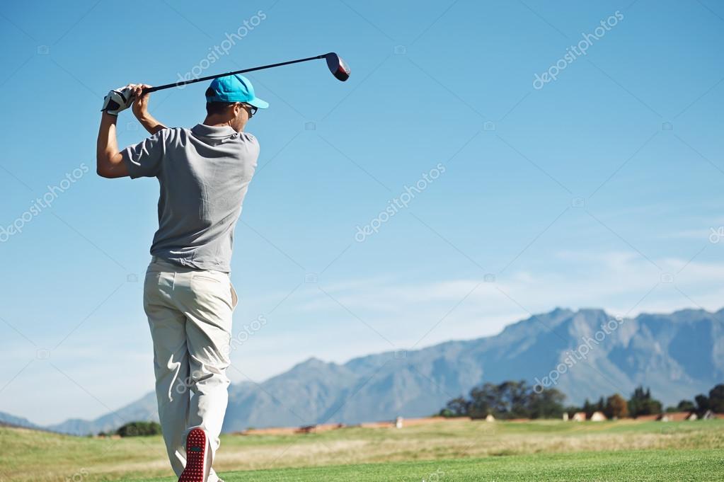 Golfer hitting tee shot — Stock Photo © Daxiao_Productions #74976195