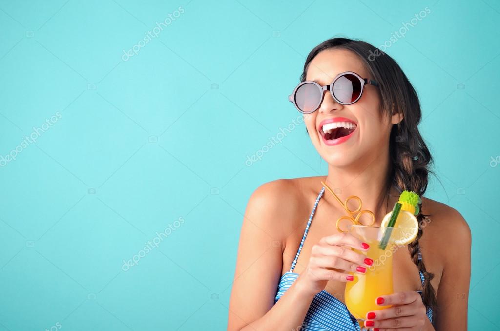 Woman drinking a cocktail Stock Photo by ©Daxiao_Productions 80863480