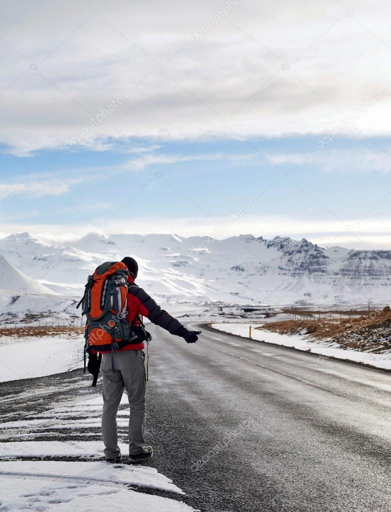 Hitchhiking backpacker in iceland — Stock Photo © Daxiao_Productions ...