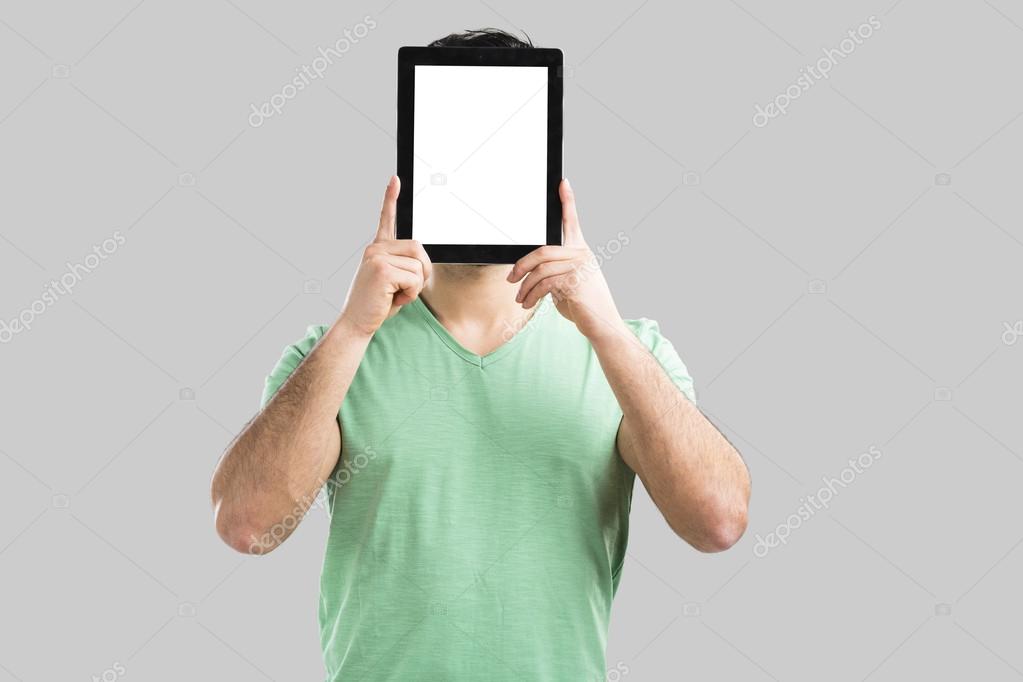 Man showing something on tablet Stock Photo by ©ikostudio 88758150