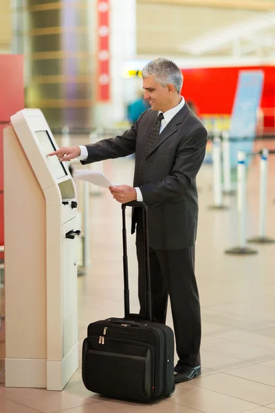 Check in machine fotos de stock, imágenes de Check in machine sin ...