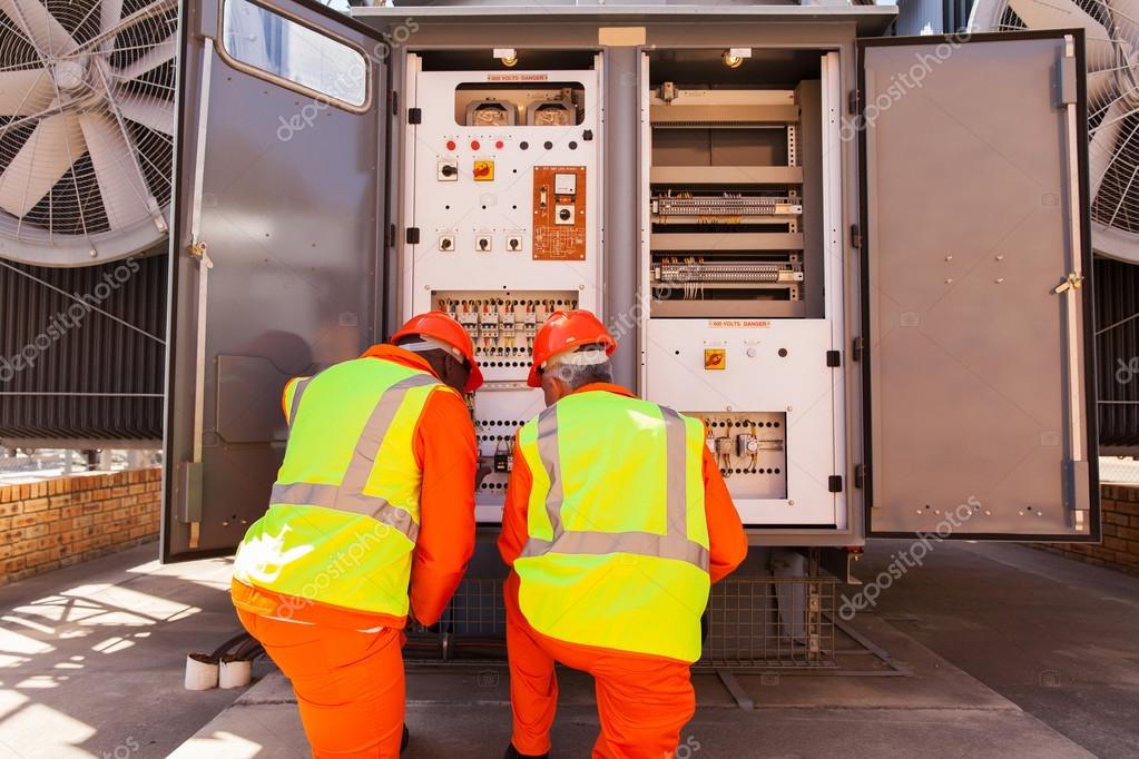 Electricians repairing transformer — Stock Photo © michaeljung #58175541