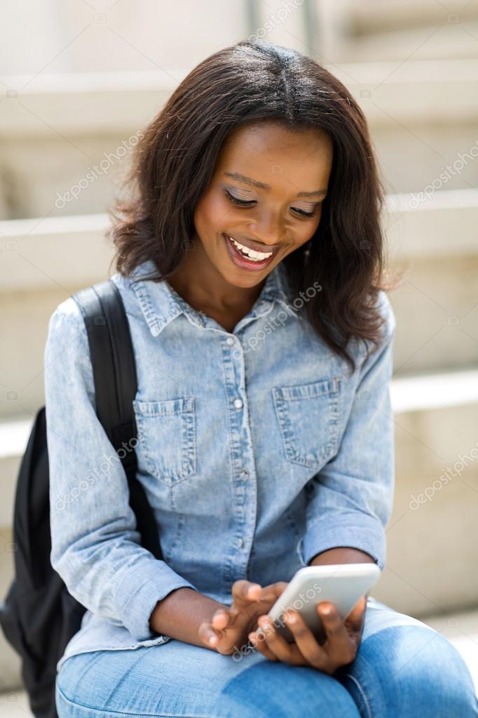 Student using smart phone — Stock Photo © michaeljung #66101485 Student using smart phone — Stock Photo © michaeljung #66101485