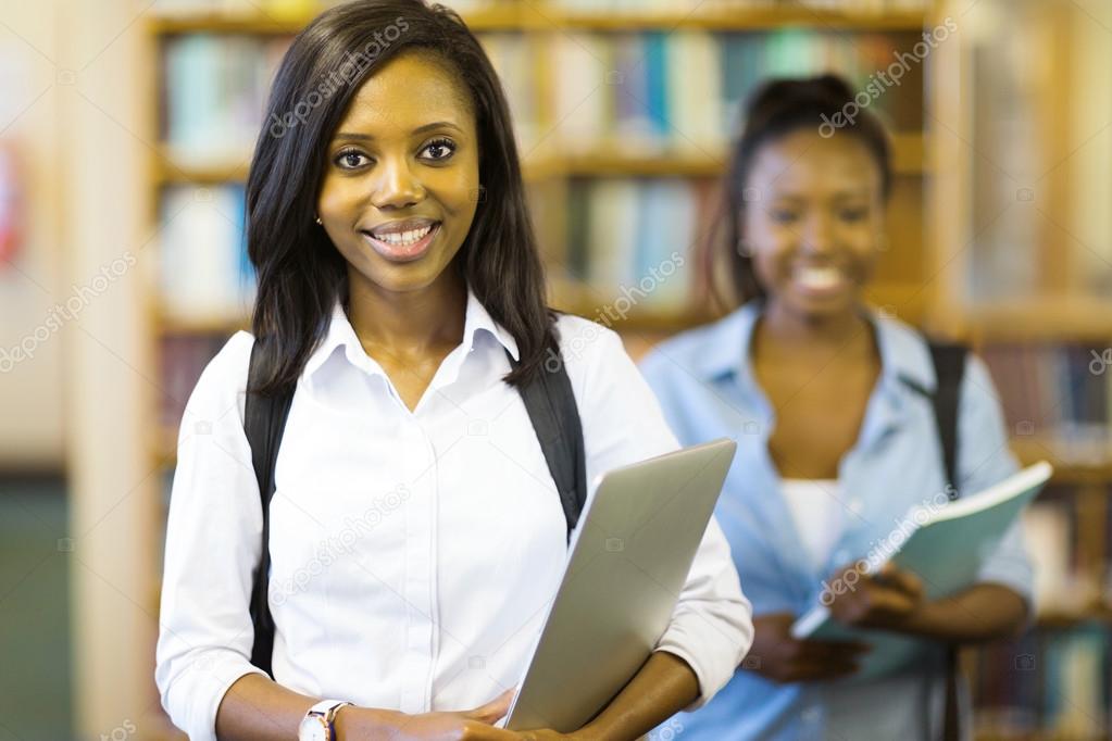 Student holding laptop Stock Photo by ©michaeljung 77094235