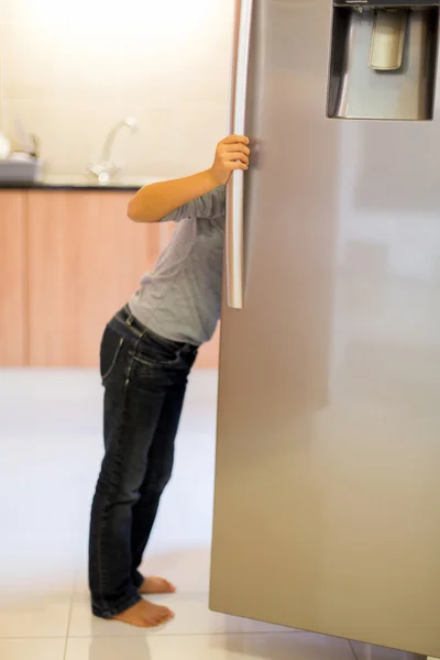 Child opening fridge Stock Photos, Royalty Free Child opening fridge ...