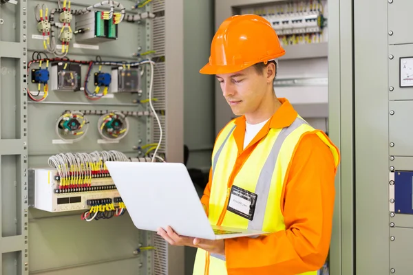 Engineer using laptop computer - Stock Image - Everypixel