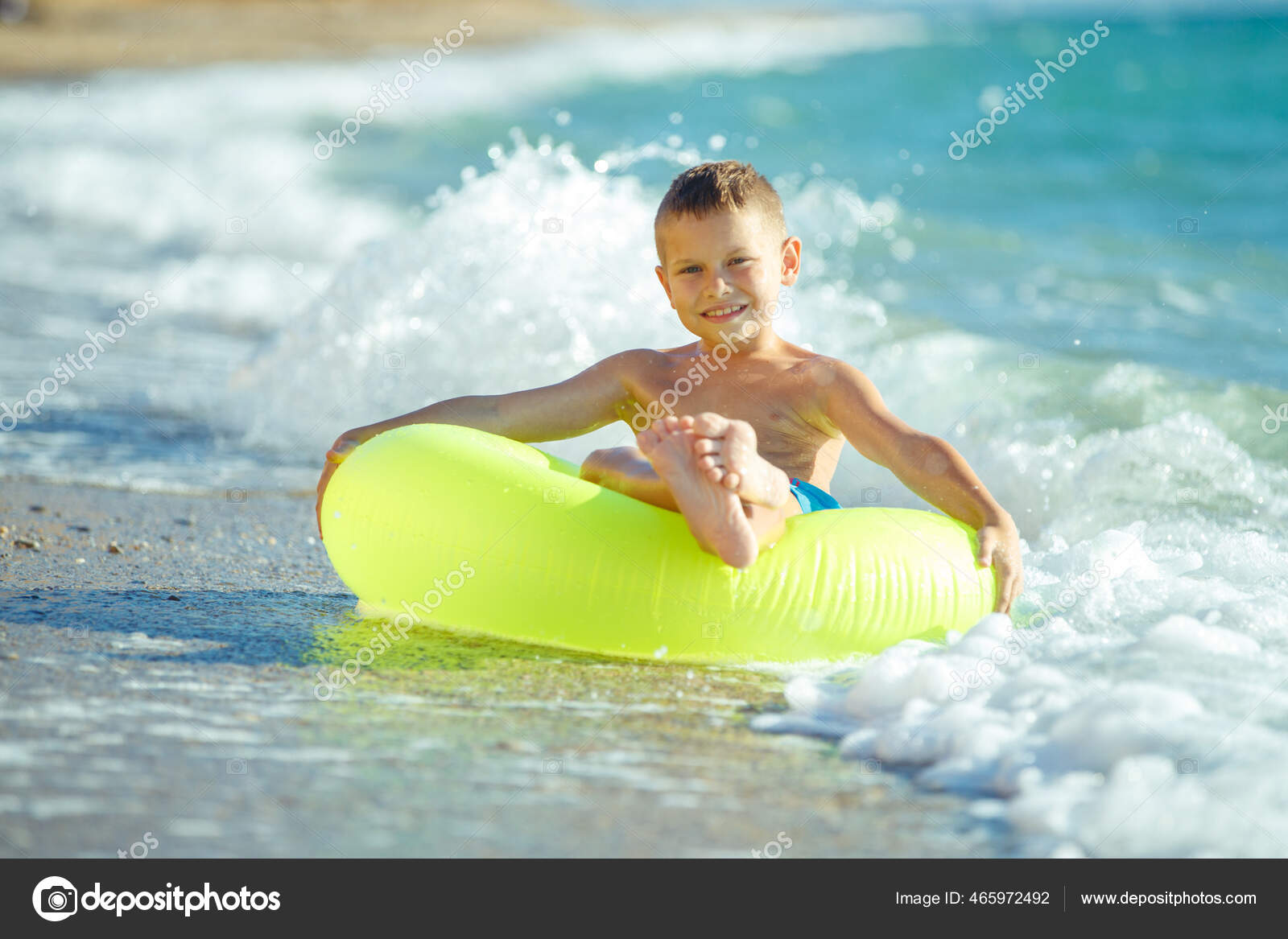 Boy child has fun at sea. Summer, happiness, sea and a child with a ...