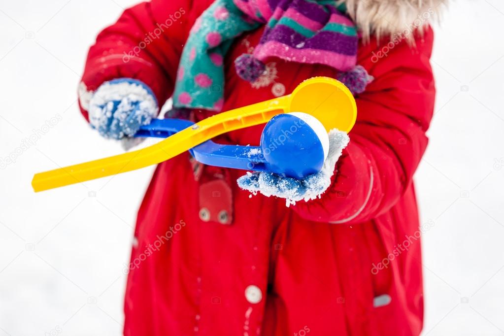 Creating snowball at winter. Stock Photo by ©Alex_Ishchenko 95336632
