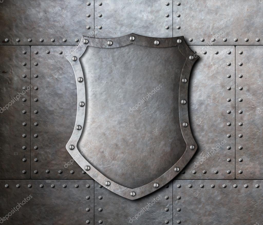 Metal shield over armor plates background Stock Photo by ©Andrey_Kuzmin ...