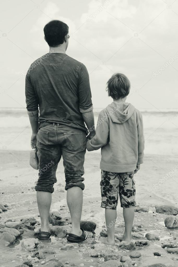 Father And Son Walking Away From Each Other