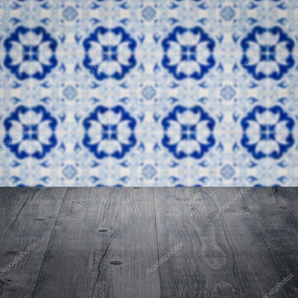 Wood table top and blur ceramic tile wall — Stock Photo © homydesign ...