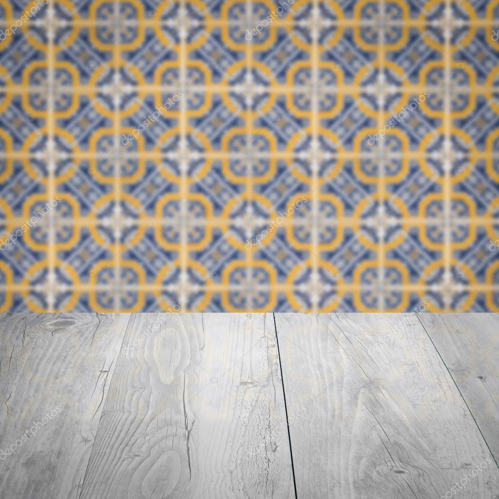 Wood table top and blur ceramic tile wall — Stock Photo © homydesign ...