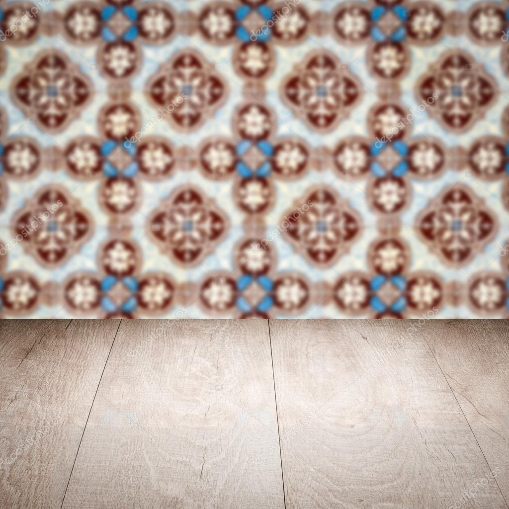 Wood table top and blur ceramic tile wall — Stock Photo © homydesign ...