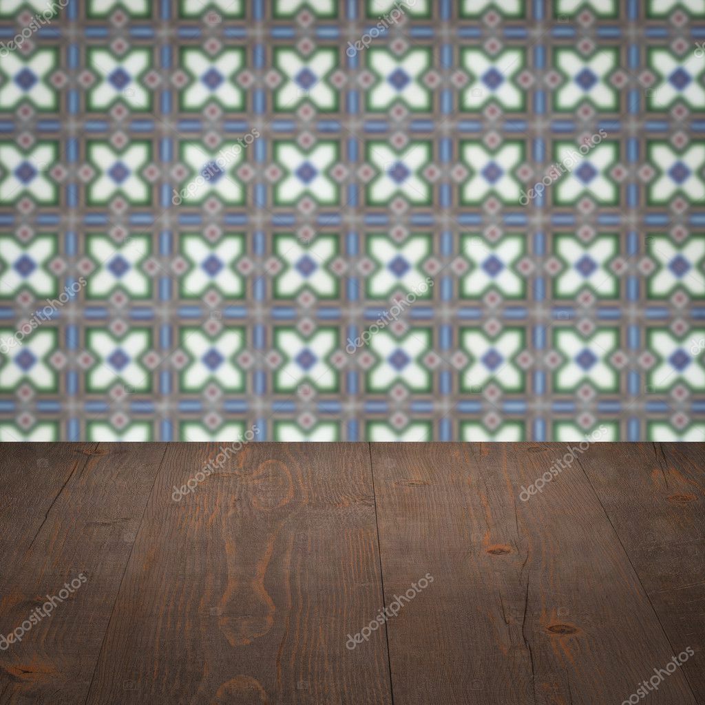 Wood table top and blur ceramic tile wall — Stock Photo © homydesign ...