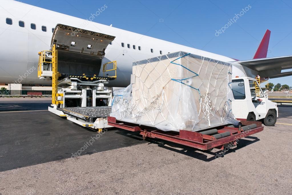 Loading cargo plane Stock Photo by ©pierivb 111543608