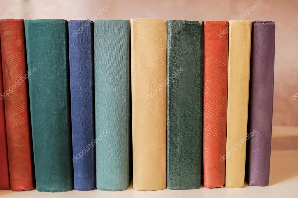 Horizontal stack of old books on a shelf — Stock Photo © yashabaker ...