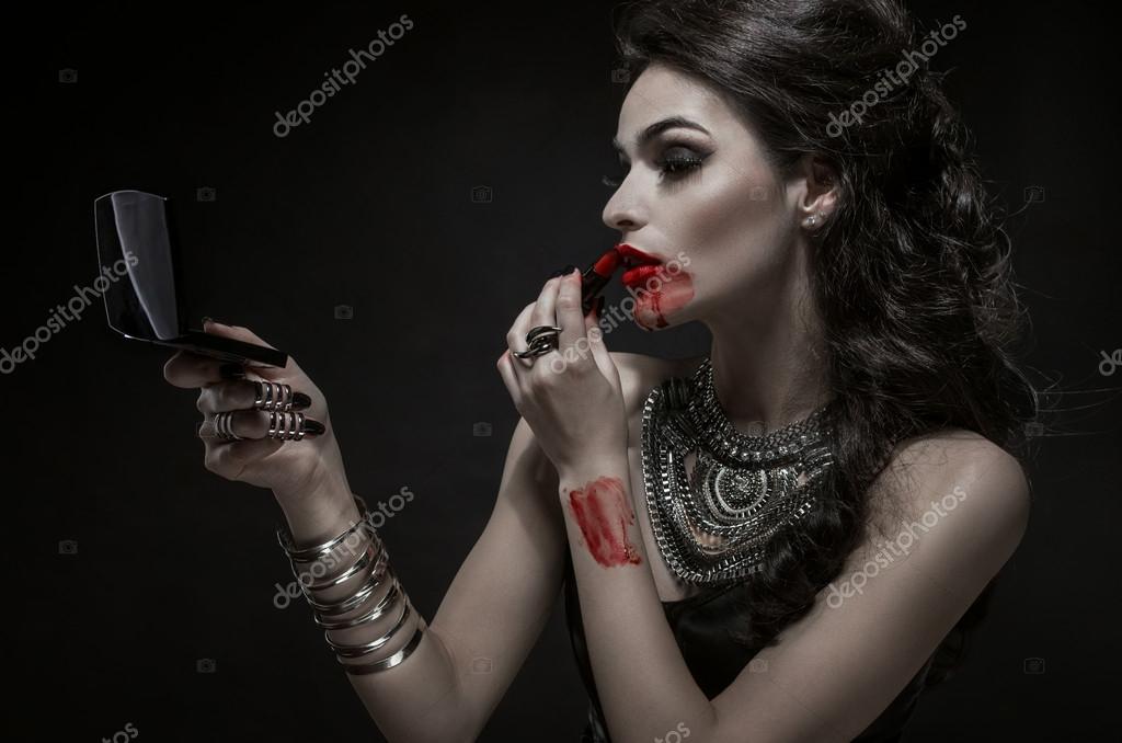 Portrait of a gothic vampire woman Stock Photo by ©FlexDreams 57382263
