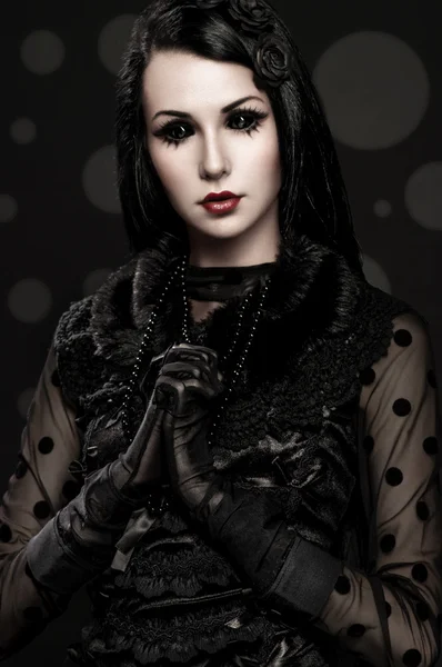 Girl-alien with black eyes Stock Photo by ©FlexDreams 69721825