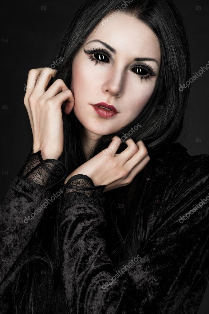 Girl-alien with black eyes Stock Photo by ©FlexDreams 69721827