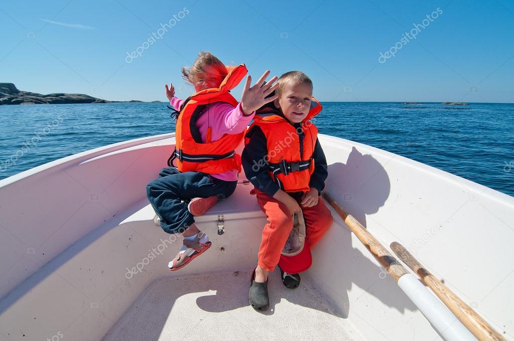 Smiling kids on the boat Stock Photo by ©mamasita 73112501
