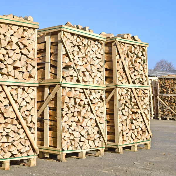 Chipped fire wood in packing on pallets - Stock Image - Everypixel