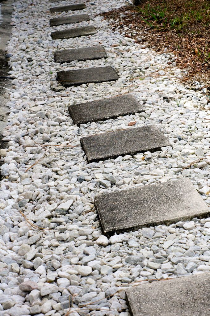 Cement stepping stone walkway Stock Photo by ©sorsillo 100136688