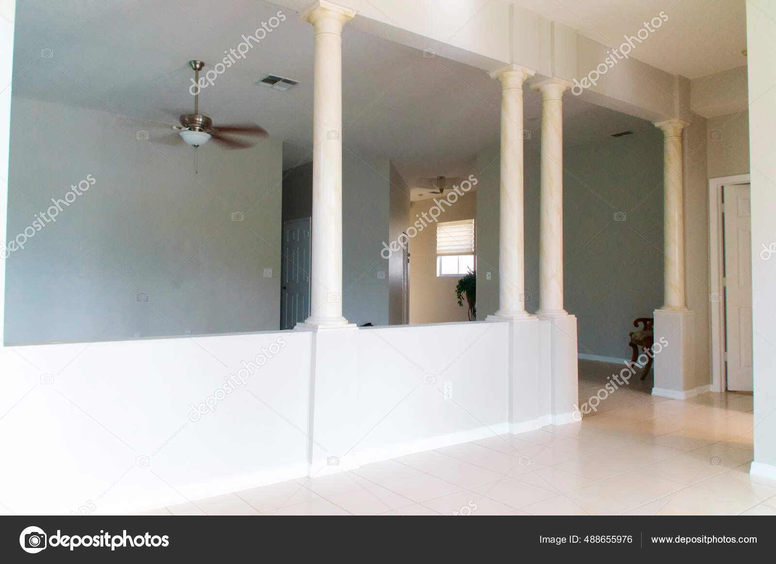 Large Empty Neutral Colored Room Columns Showing Hallways Doors — Stock ...