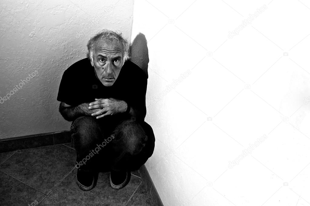 Woman Crouching In Fear