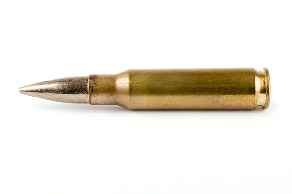 Rifle bullet on white — Stock Photo © belchonock #140908212