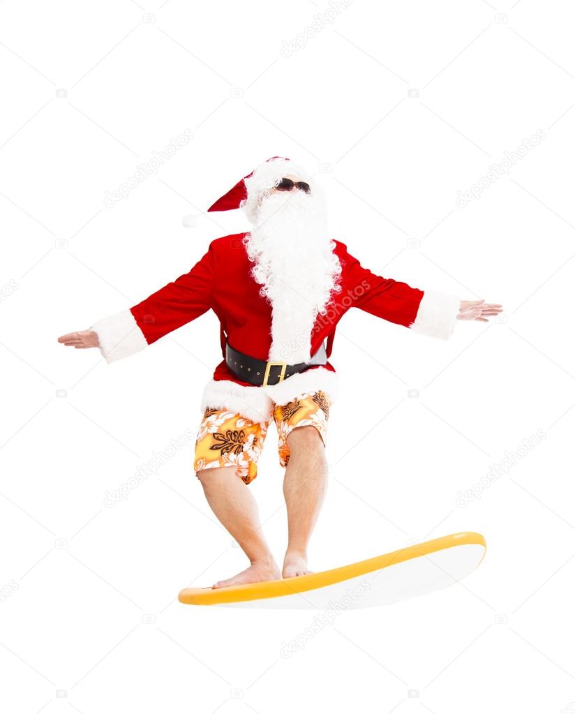 Happy Santa Claus surfing with surf board Stock Photo by ©tomwang 84802048