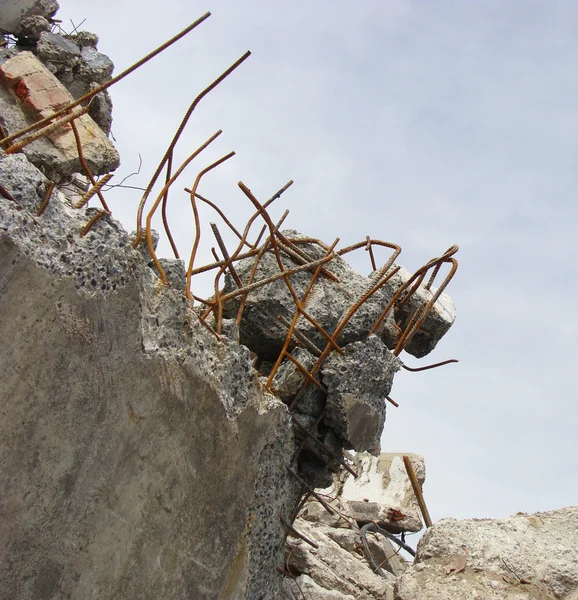 Concrete rubble and twisted rusty metal on a demolition site - Stock ...