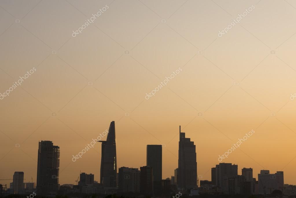 Sunset in Saigon with Bitexco tower silhouette, Vietnam Stock Photo by ...