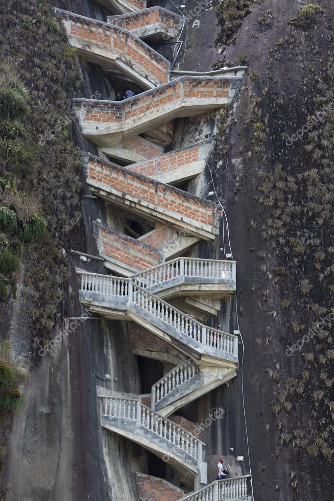 Steep steps rising up Guatape Rock, the Piedra el Penol, Colombi ...