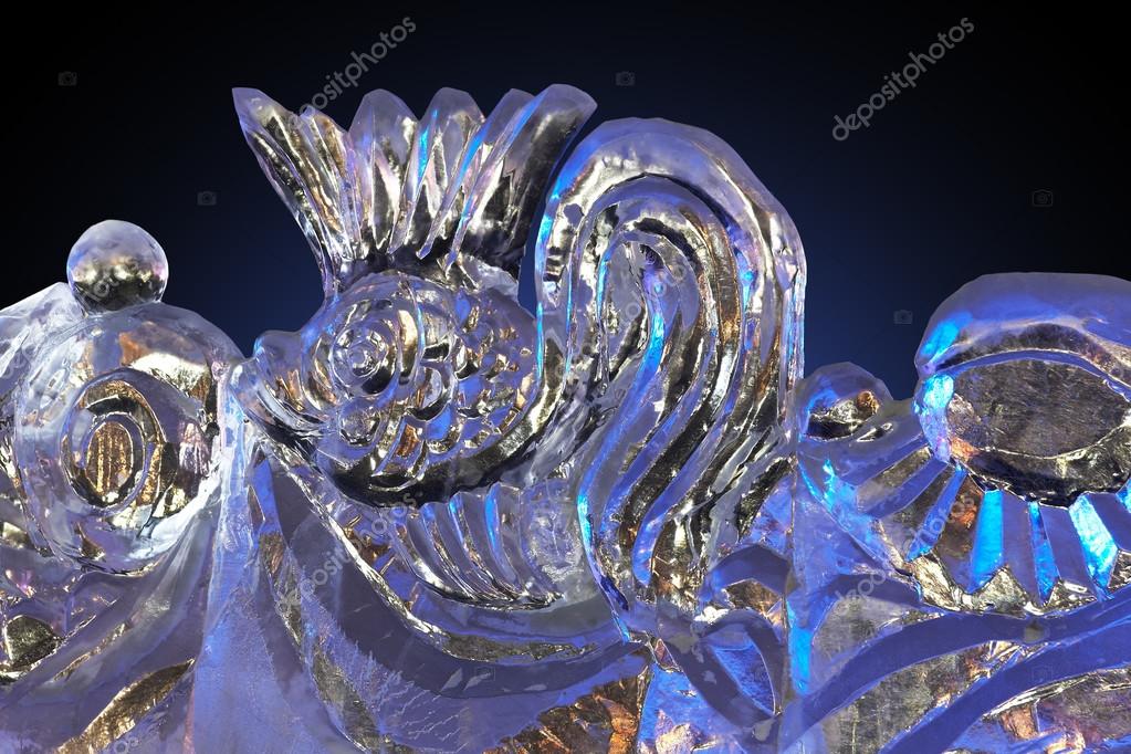 Magic of ice sculpture. — Stock Photo © Milovidov #58373701