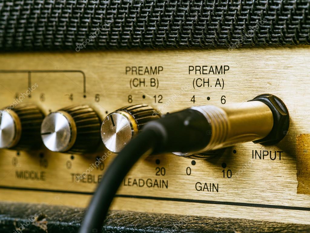 Vintage amplifier knobs and input Stock Photo by ©sumners 111319152