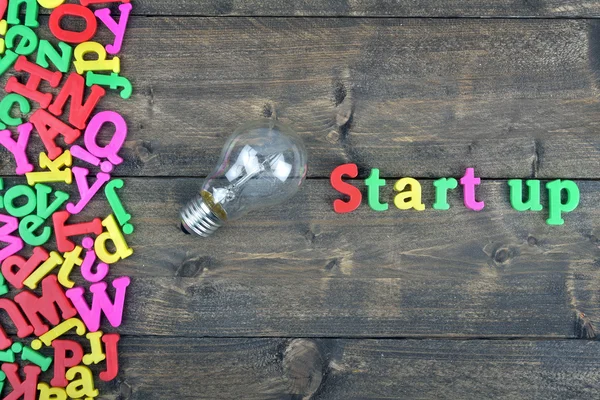 Start up on wooden table - Stock Image - Everypixel