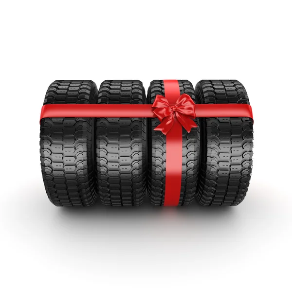 Gift set of tires wrapped ribbon and bow isolated — Stock Photo ...