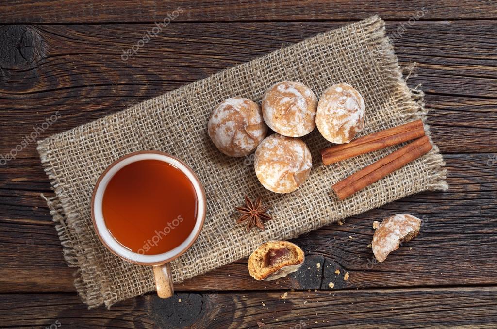 Tea with glazed gingerbreads Stock Photo by ©Sasajo 107389334