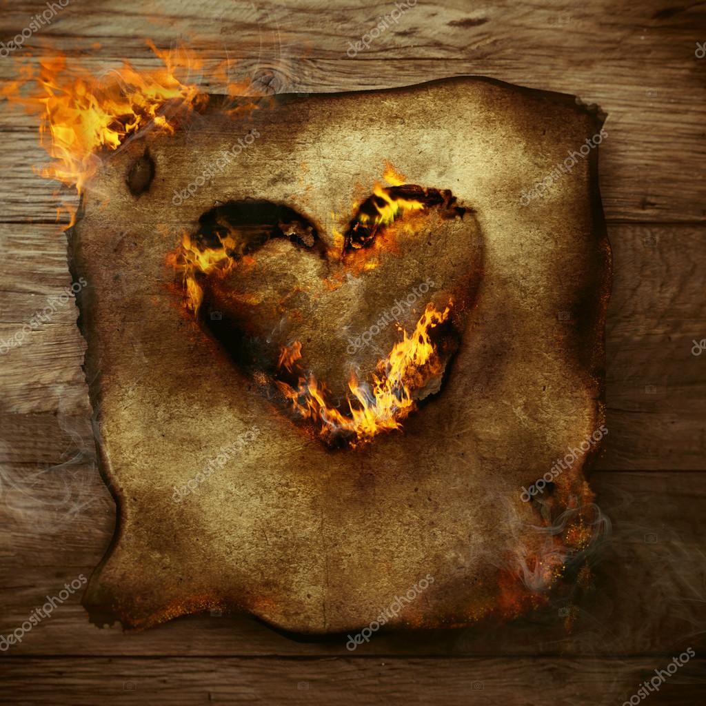 Burning heart — Stock Photo © mythja #63239203
