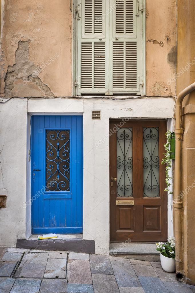 Two doors and window — Stock Photo © elenathewise #80866732