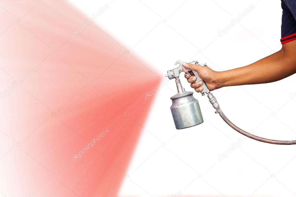 Hand holding spray gun Stock Photo by ©sydeen 60634635