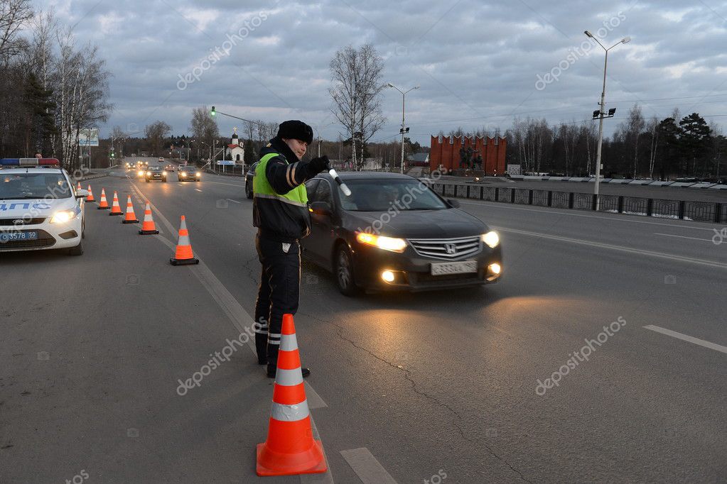 The inspector of traffic police stops the car. – Stock Editorial Photo ...