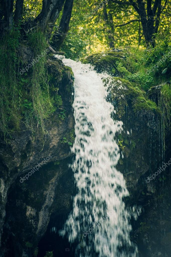 Small mountain river waterfall Stock Photo by ©cokacoka 122102226