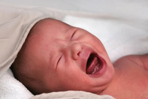 Crying newborn baby in the hospital Stock Photo by ©artush 46188585