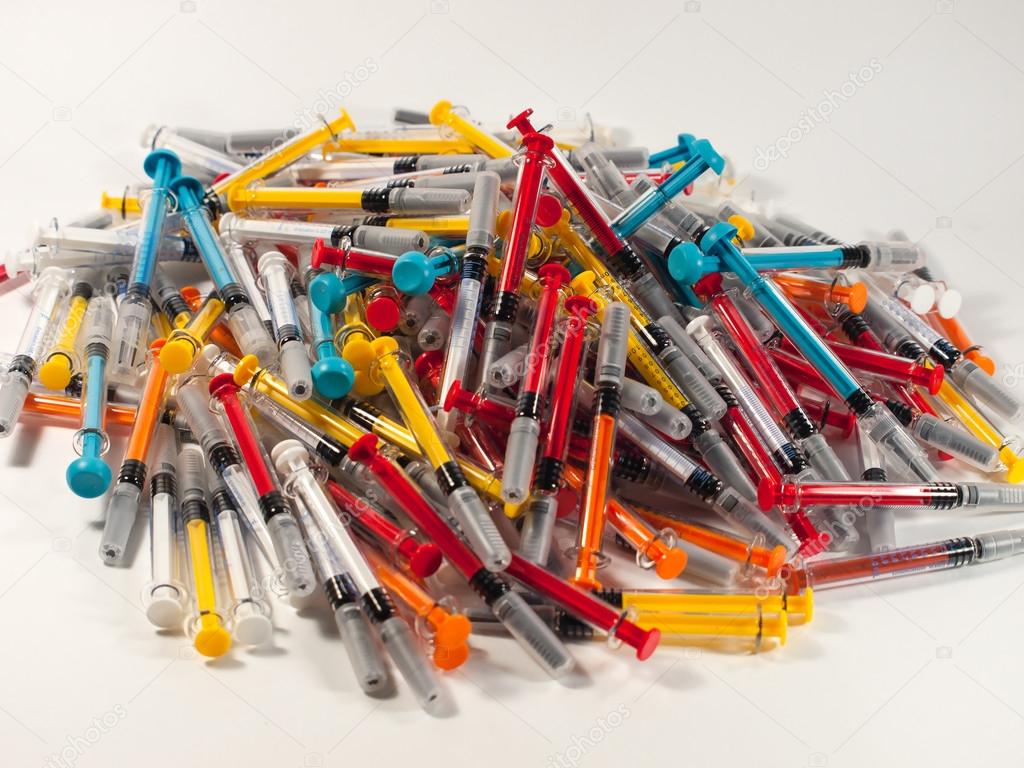 Syringes of different colors — Stock Photo © stain-v #66427543