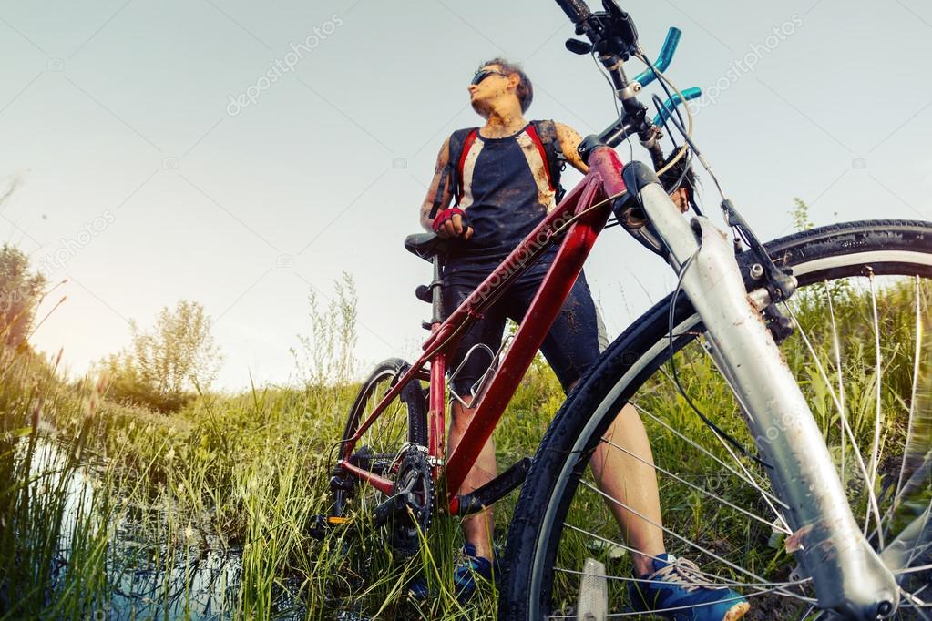 Young man in the swamp Stock Photo by ©mihtiander 75543471